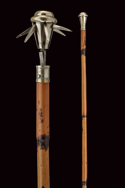 A Very Rare Cane Mace With Spring Spikes