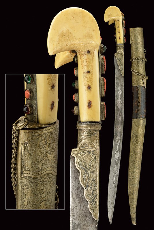A yatagan with rare mounts