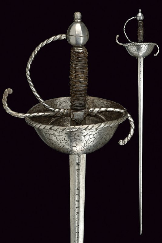 An engraved cup hilted sword