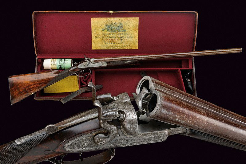 A fine cased double barrelled breech loading shotgun by