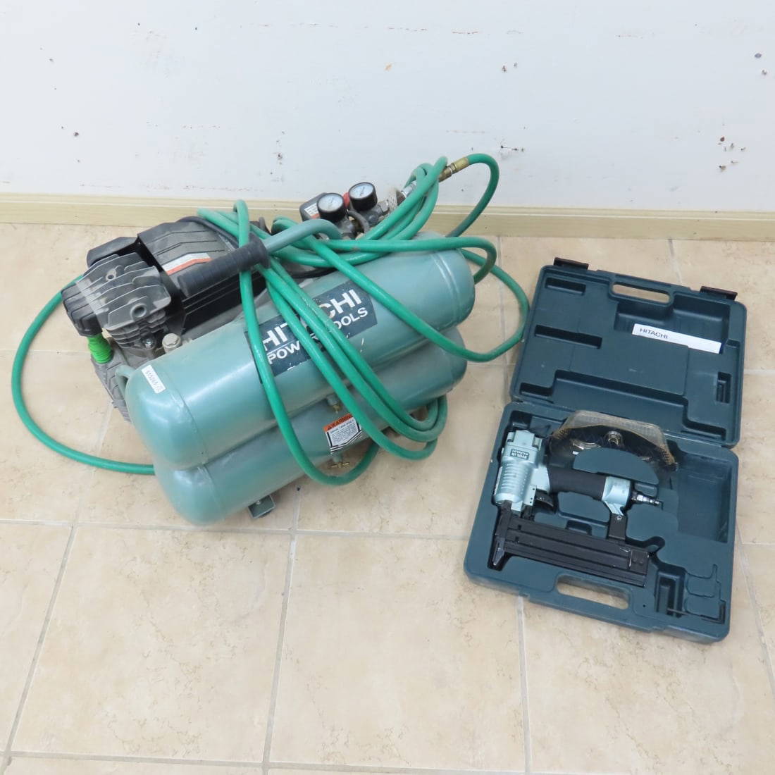 Hitachi Air Compressor Ec-12 And Nail Gun Auction