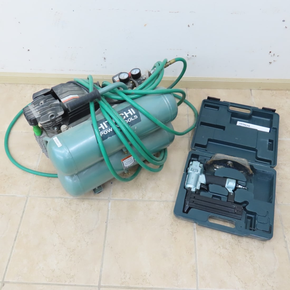 Hitachi Air Compressor Ec-12 And Nail Gun Auction