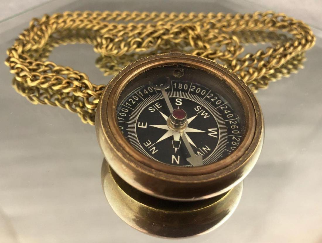 Antique bronze compass on chain