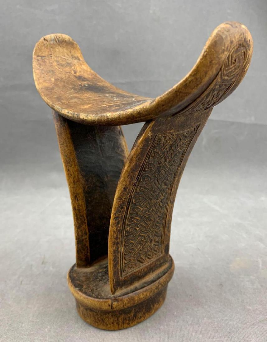 Early Ethiopian neck rest with intricate carved wood