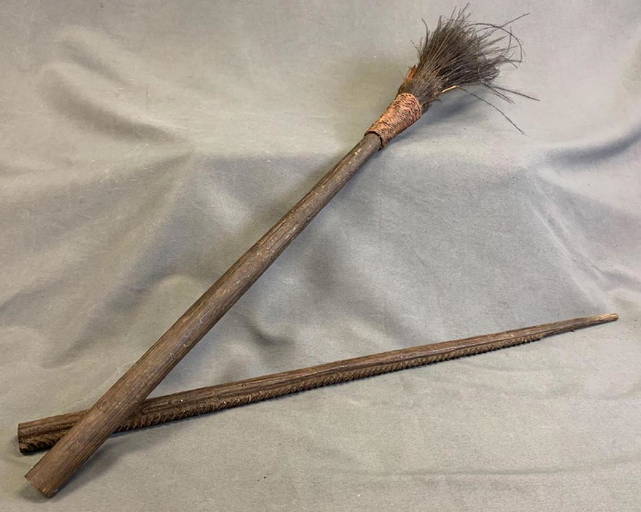 Two African Tribal Carved Wooden Rods, One Feathered