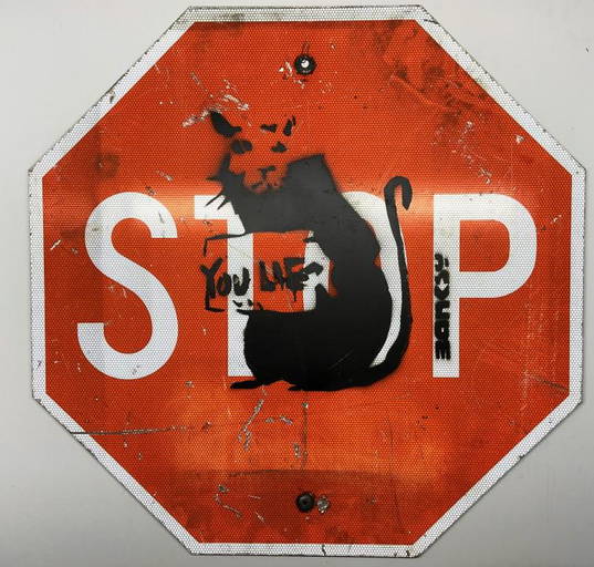 Banksy Spray Paint Over Original Stop Sign