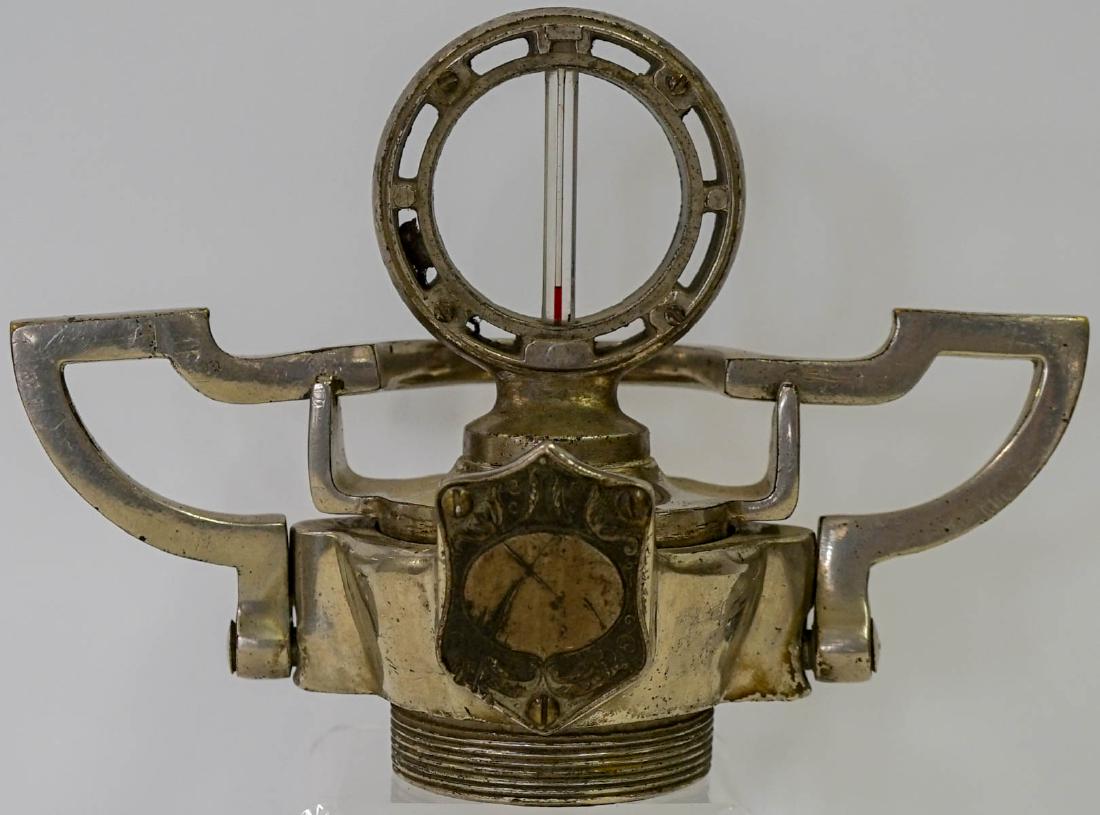 An Antique Radiator Cap