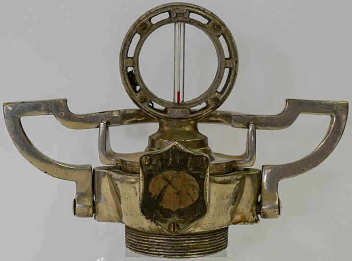 An Antique Radiator Cap