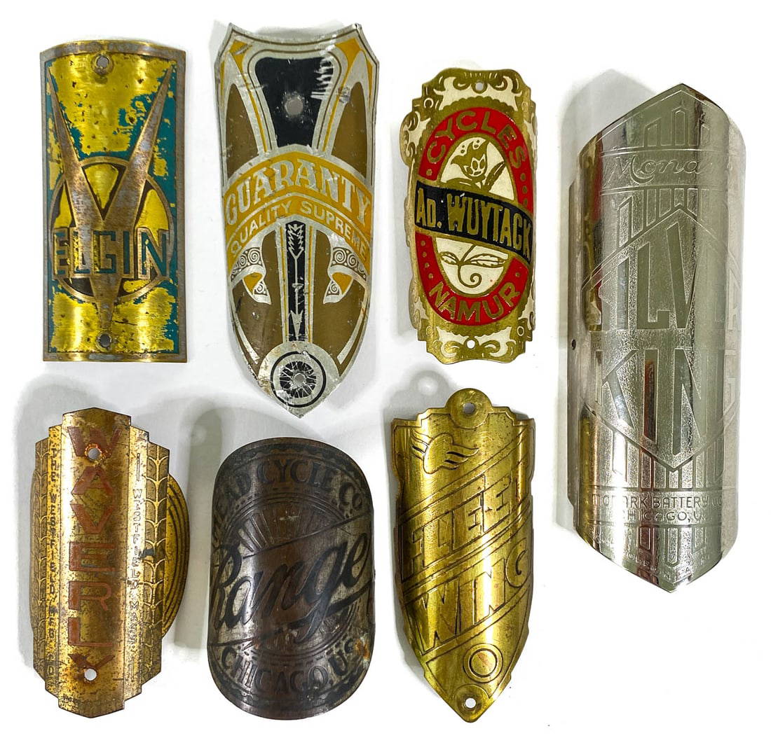Seven Vintage Bicycle Head Badges Auction