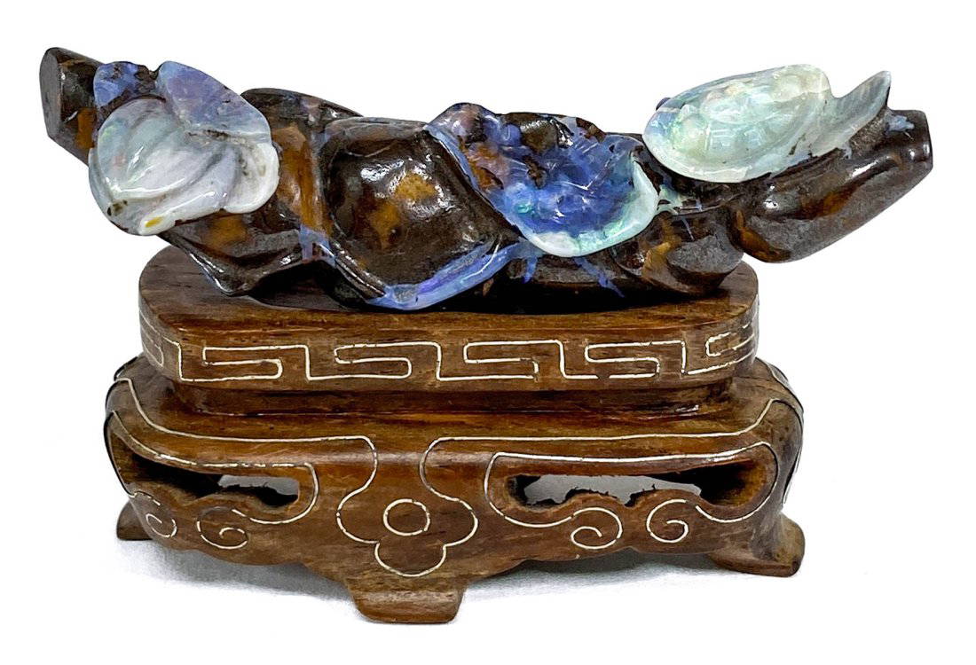 A Chinese Opal Carving On Stand Auction