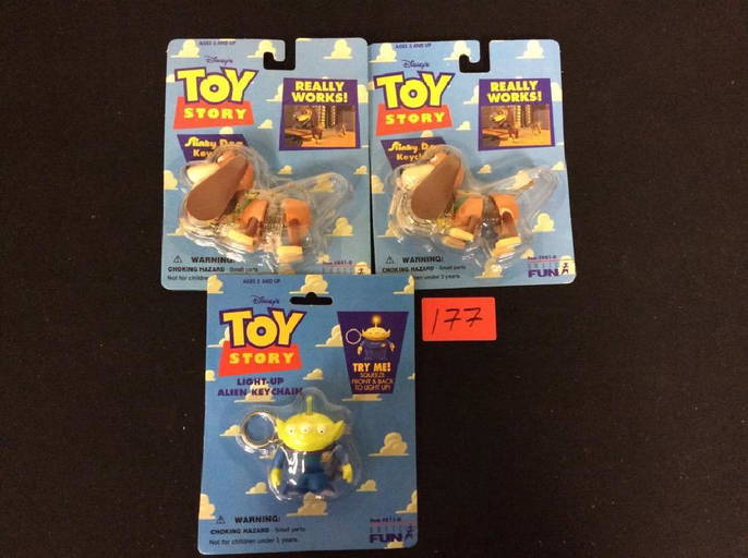 Vintage Original Toy Story Keychains. Two Slinky Dogs