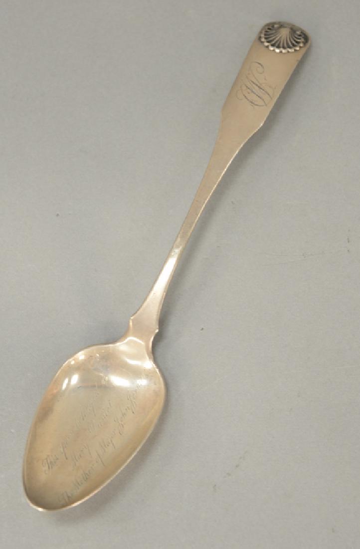 Coin silver spoon, engraved: This spoon belonged to