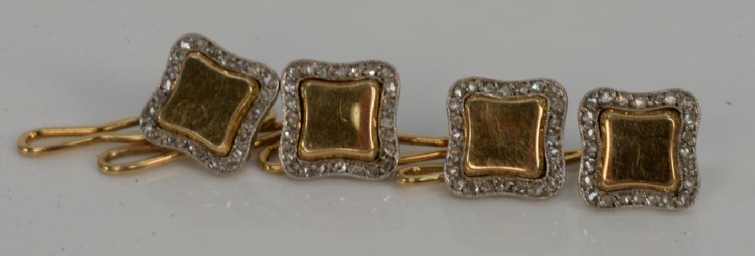 Set of four 18 karat gold and platinum buttons with