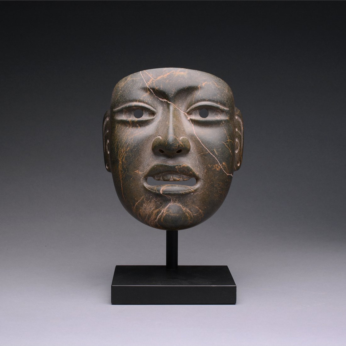 A Fine Olmec Jade Stone Mask