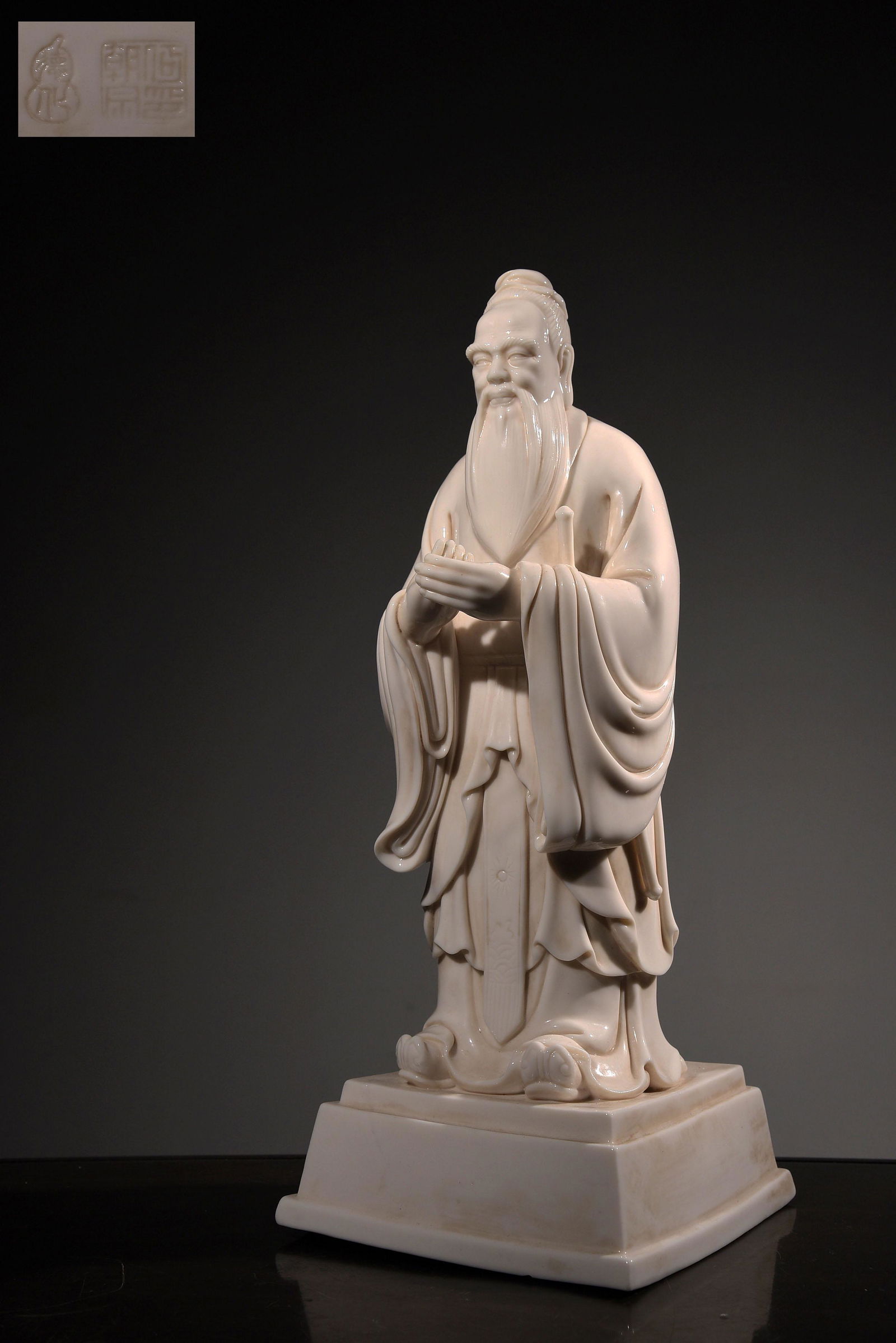 A Blanc De Chine Kong Qiu Statue Auction