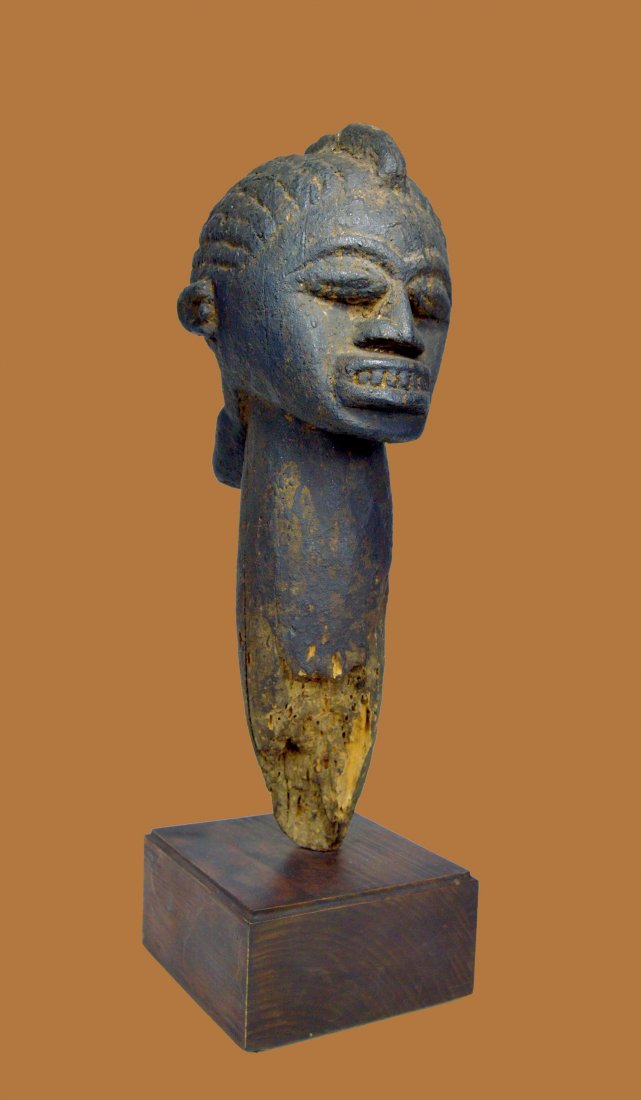 A SUPERB LOBI HEAD SCULPTURE