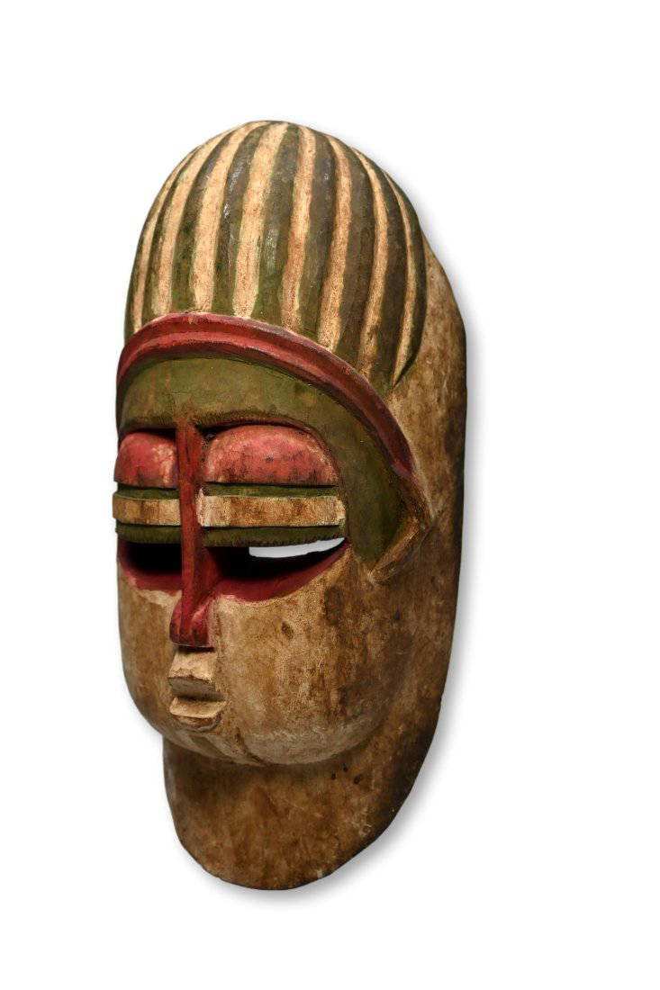 A Colorful Bini Mask Auction