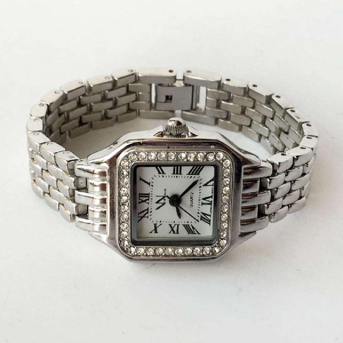 Avon rectangular silver tone ladies quartz Japan movt