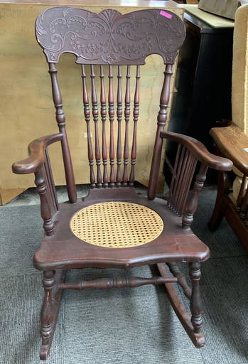 Anitique Pressed Back Rocker W/ Cane Seat.