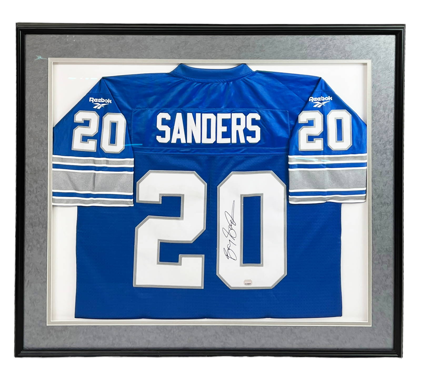 Autographed Barry Sanders Football Jersey, Framed. Auction