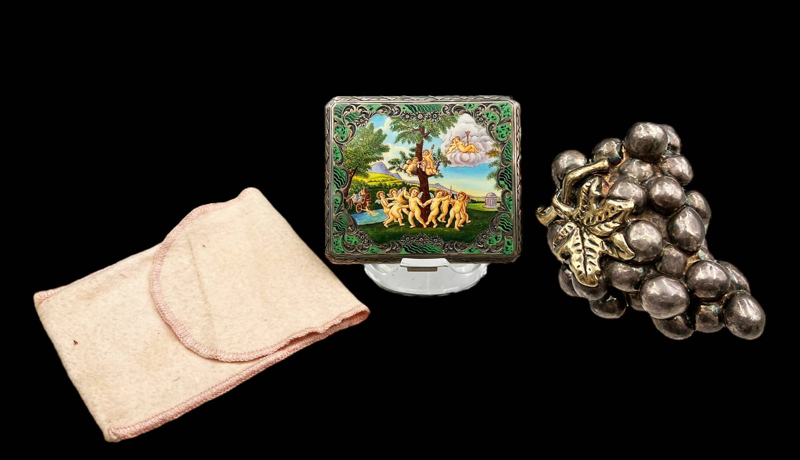 Lot: Sterling Grape Paperweight, Cherub Compact. Auction