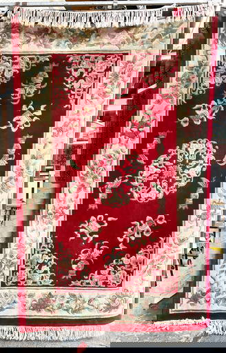 5' 3" X 8' 6" Red Chinese Sculptured Rug.