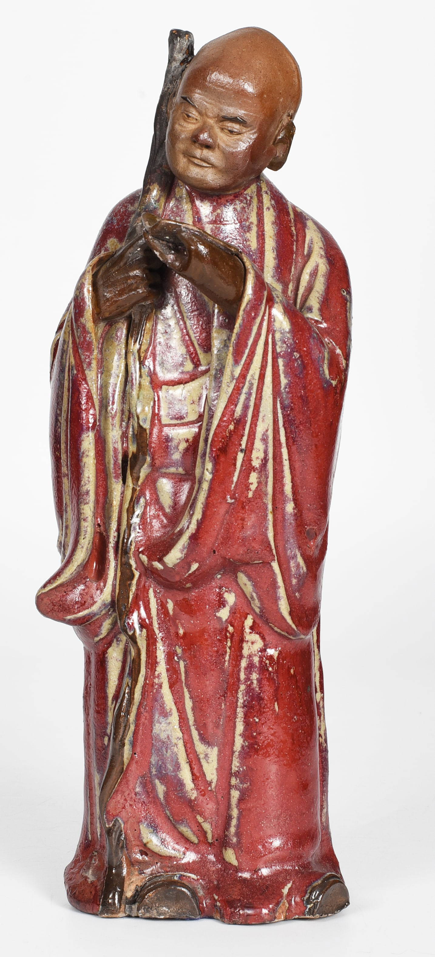 Chinese Red Shiwan Flambe Plum Glaze Immortal. Auction