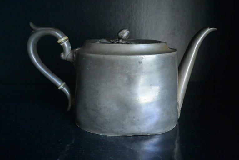 Old Tin Pot One Hundred Years Ago