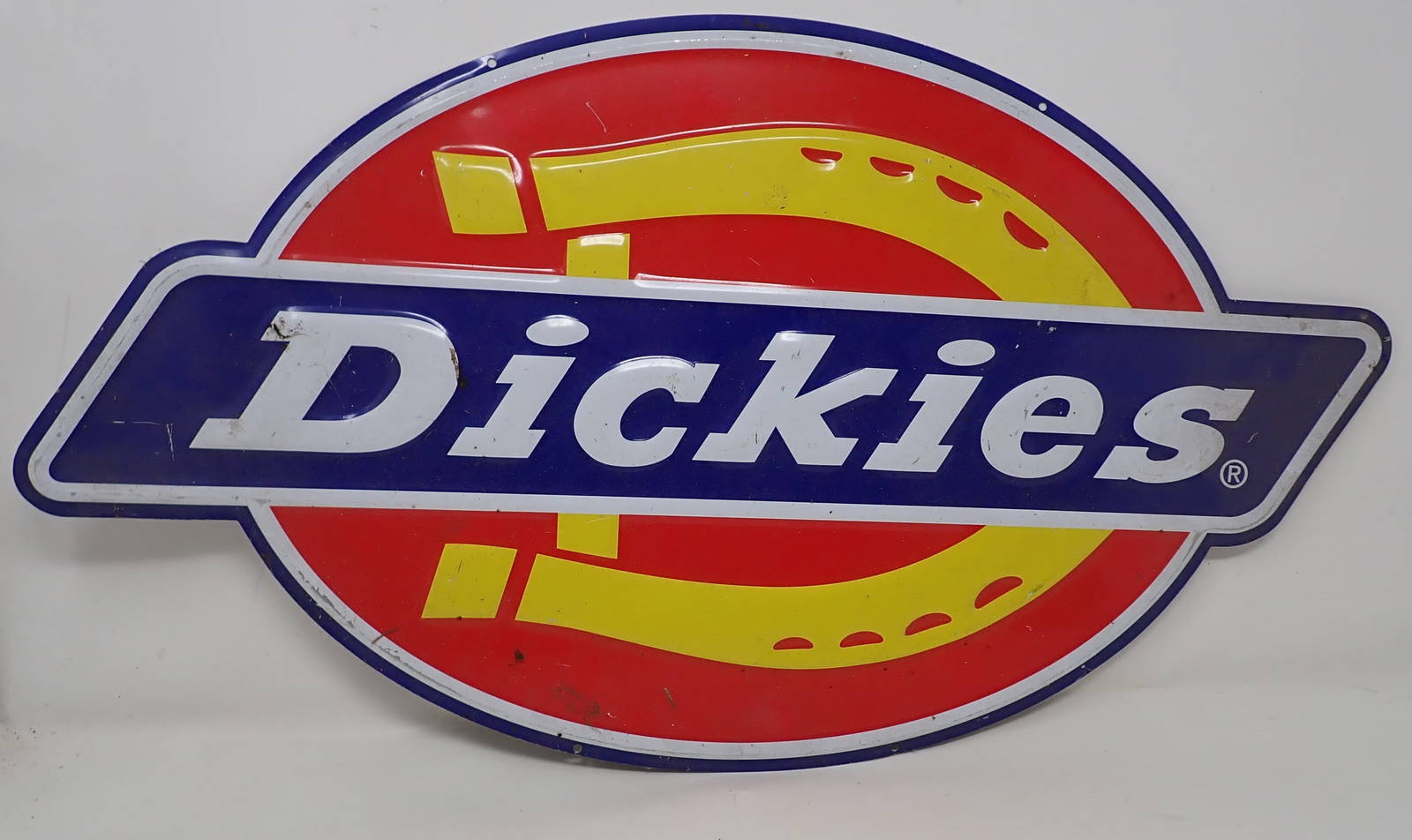 Tin Dickies Sign Auction