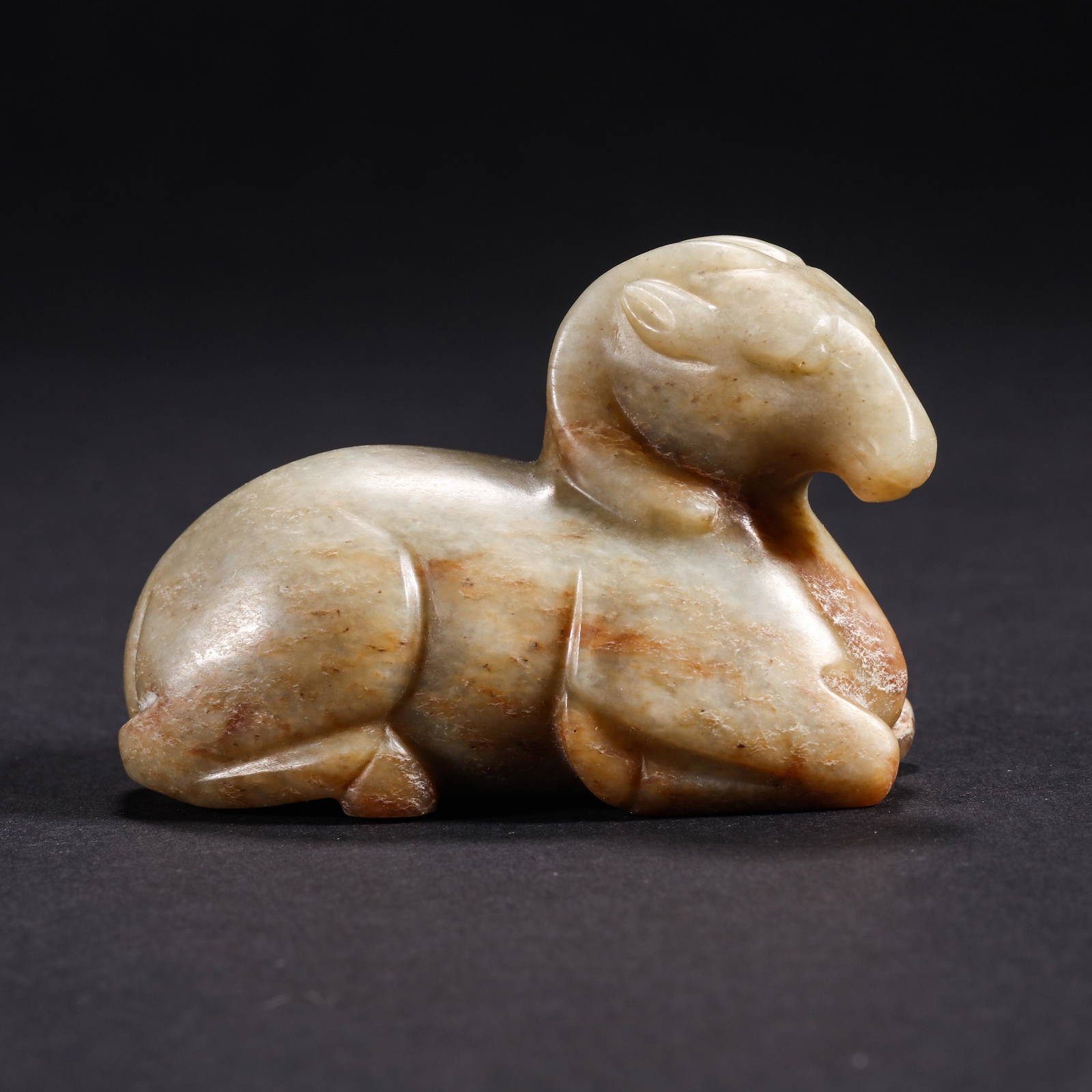 A Carved Hetian White Jade Goat Figure Auction