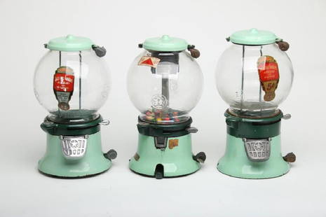 Three Vintage Gumball Machines
