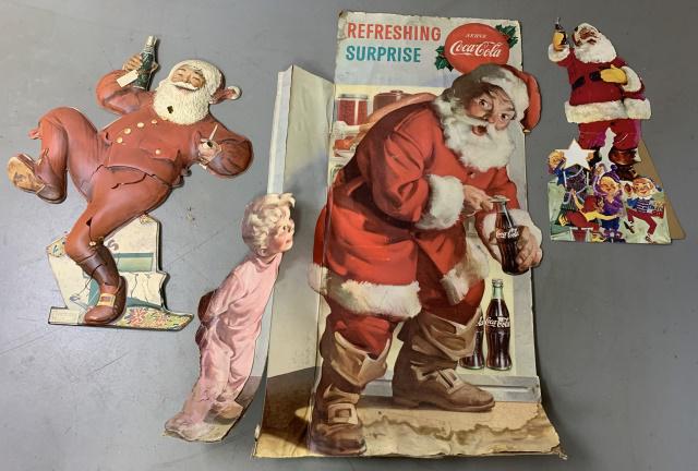 2 Coca Cola, 1 Pepsi Santa Displays