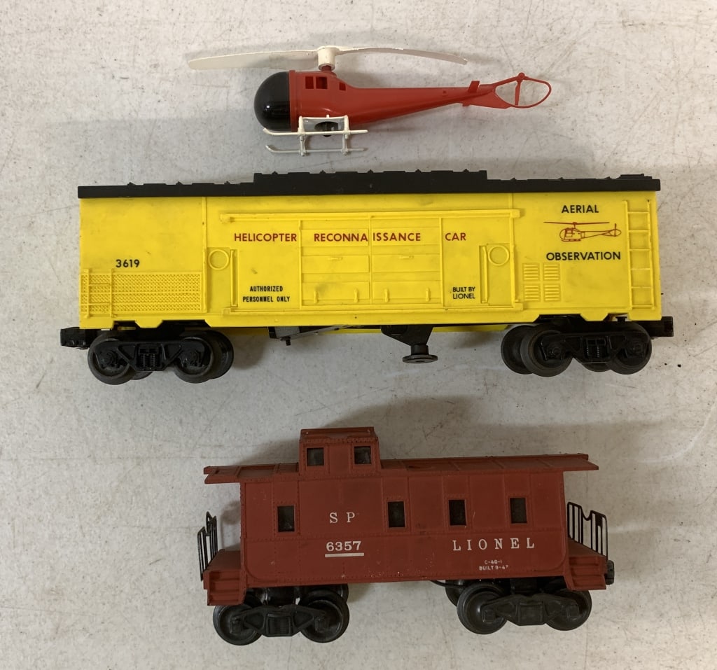 2 Lionel Pcs- Caboose & Copter Car & Boxes Auction