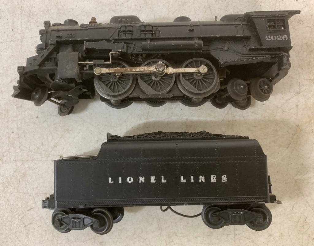 2 Lionel Pcs- Locomotive & Whistle Tender Auction