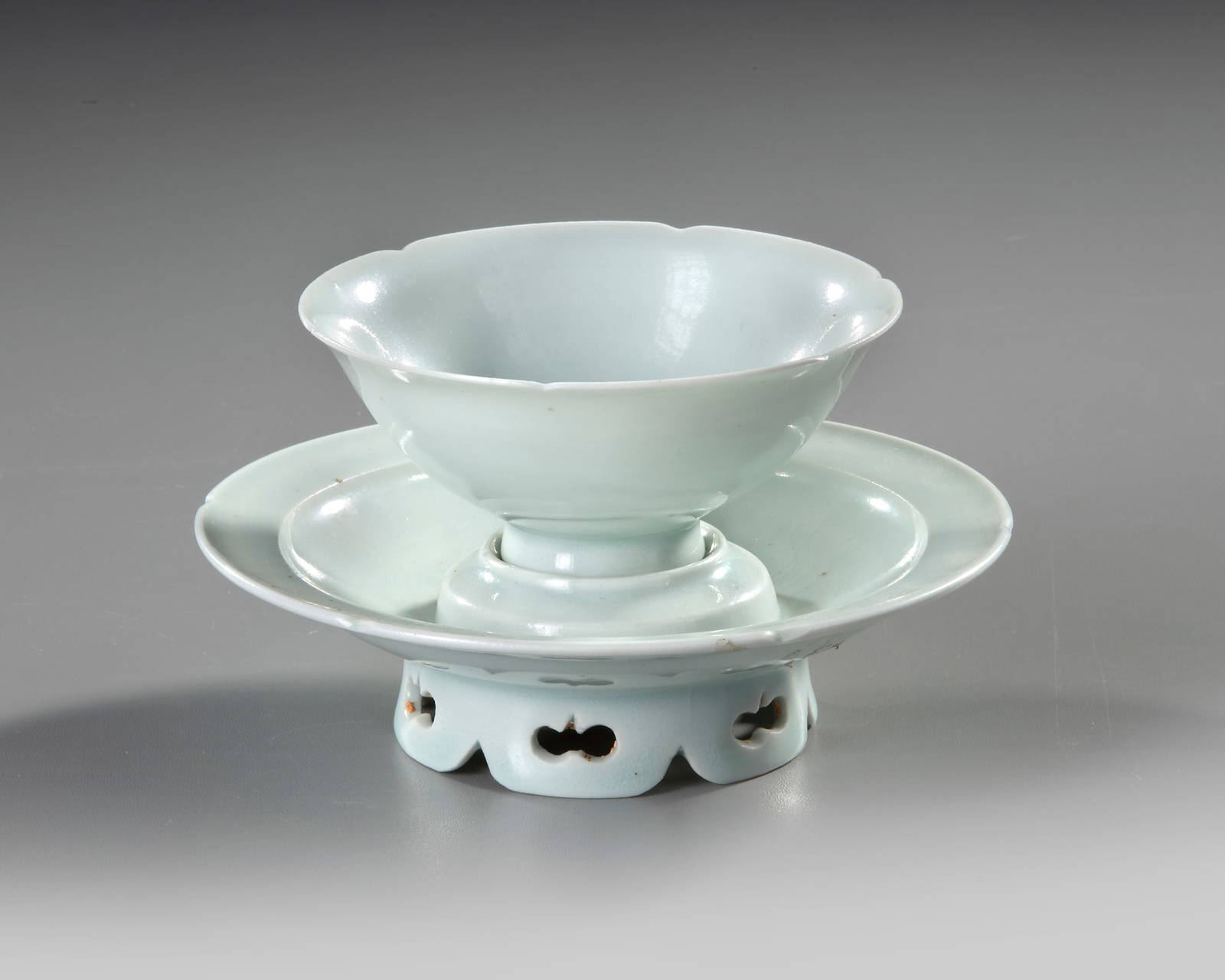 A Chinese 'qingbai' Cup And Stand, Song Dynasty (960-1279 Ad) Auction
