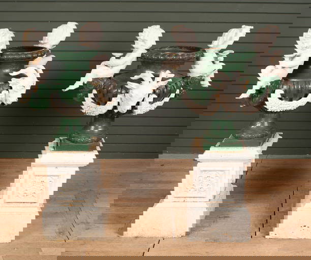 Pair Cast Iron Putti Handle Urns On Bases