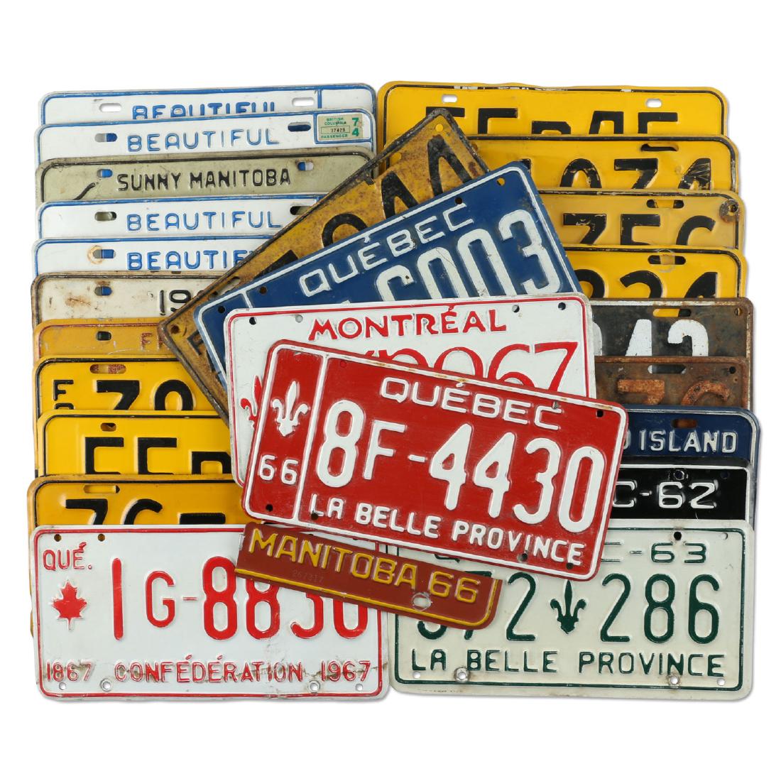 Twenty-four (24) Vintage Canadian License Plates