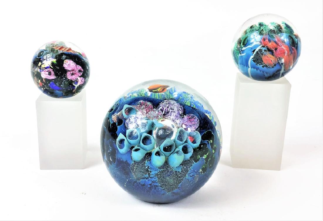 Three Josh Simpson Art Glass Planet Paperweights