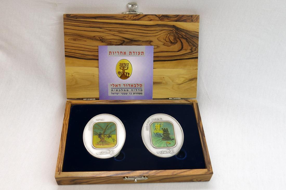 Set of Salvador Dali medals.