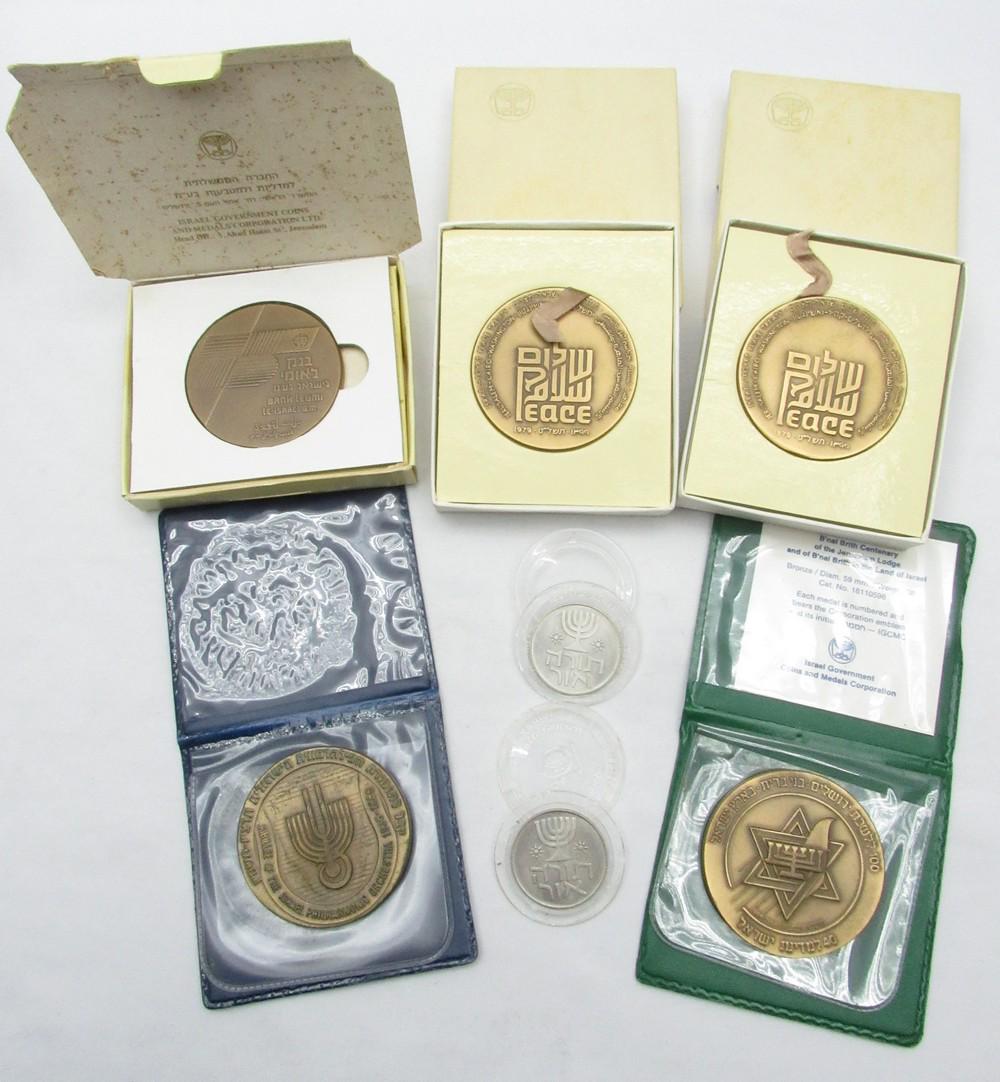 A Collection Of Medals And Coins Issued By Israel Coins And Medals Corp ...