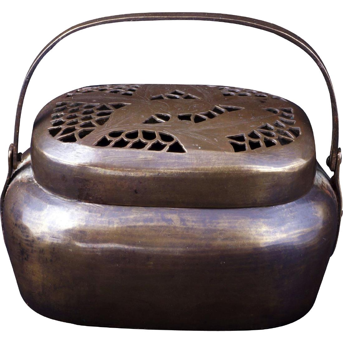 Chinese brass hand warmer with pierced top early 20th