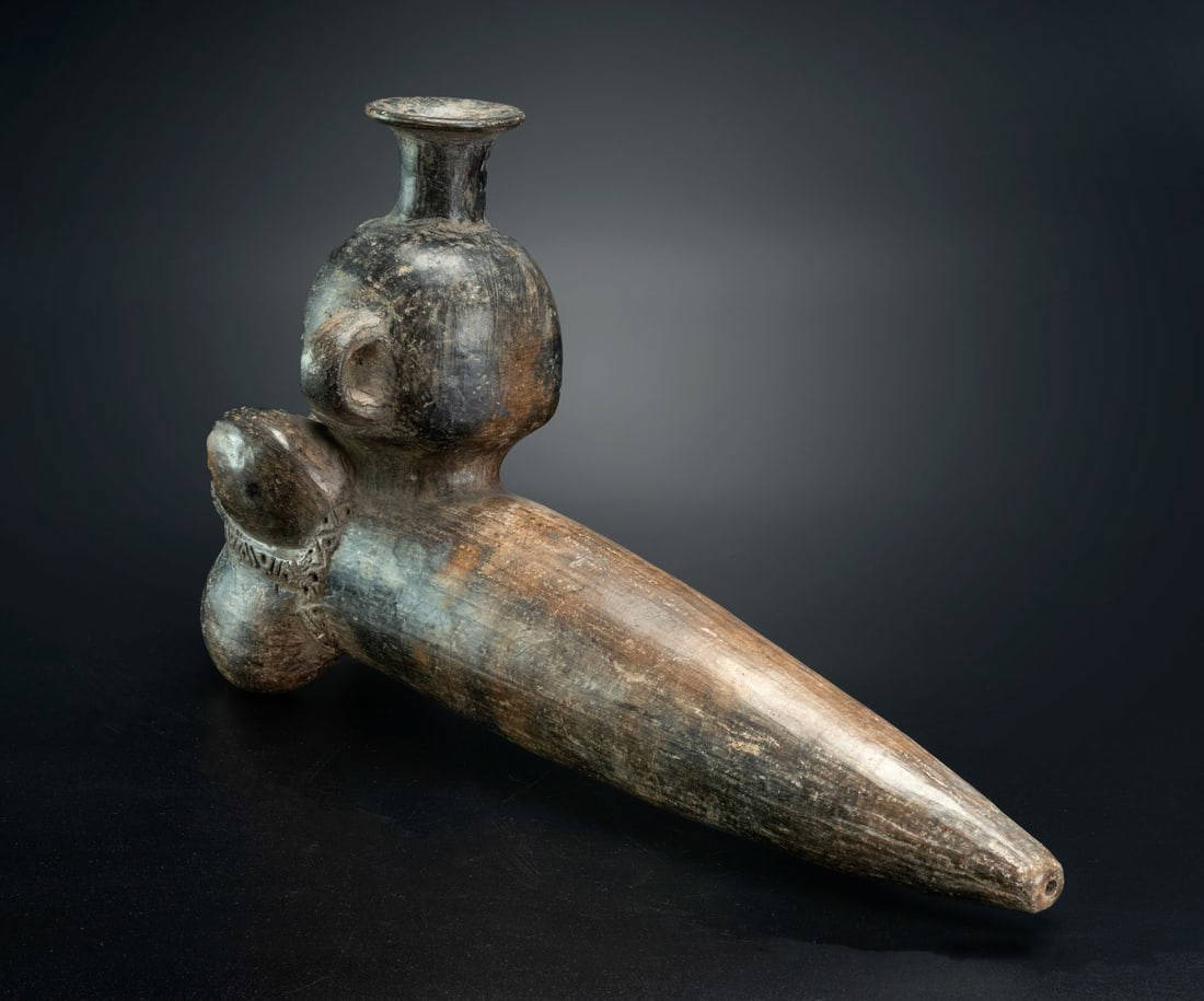 A Paccha Effigy Vessel In The Shape Of A Mace Joined With An Aribalo ...