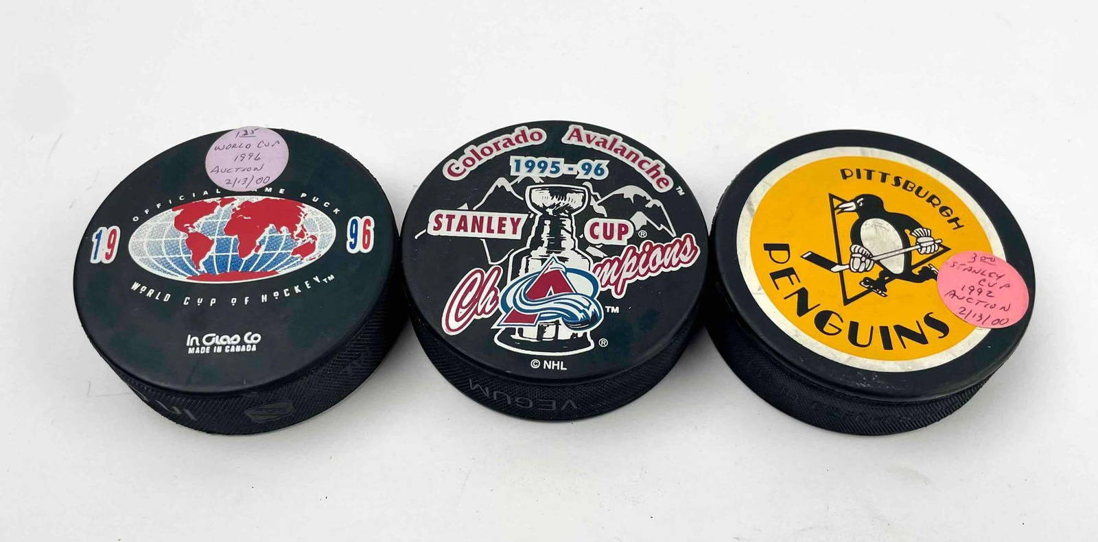 Three Collectible Hockey Game Pucks ( World Cup And Stanley Cup) Auction