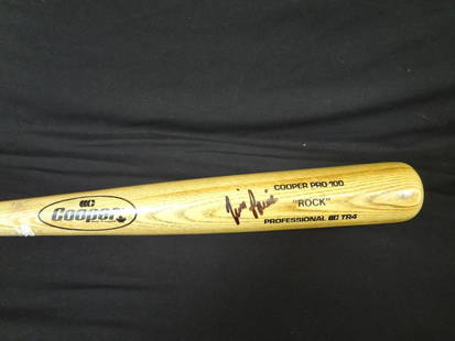 Juan Gonzalez Autographed Baseball Bat. Cooper Pro 100
