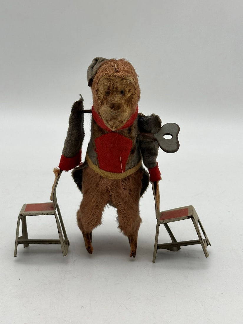 Schuco Tumbling Monkey With Chairs Auction