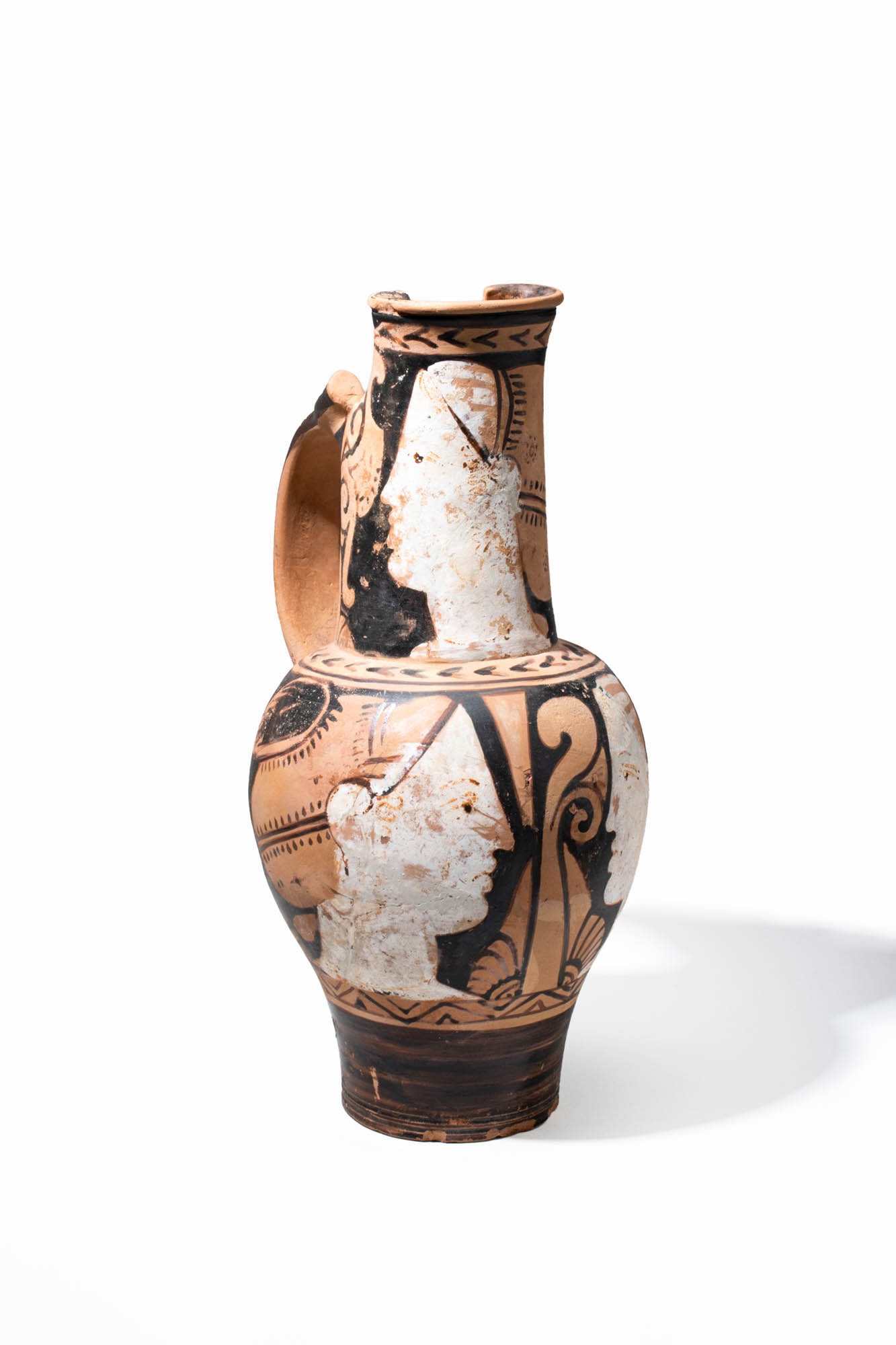 Faliscan Red-figure Beaked Oinochoe Depicting Heads Of Women Auction