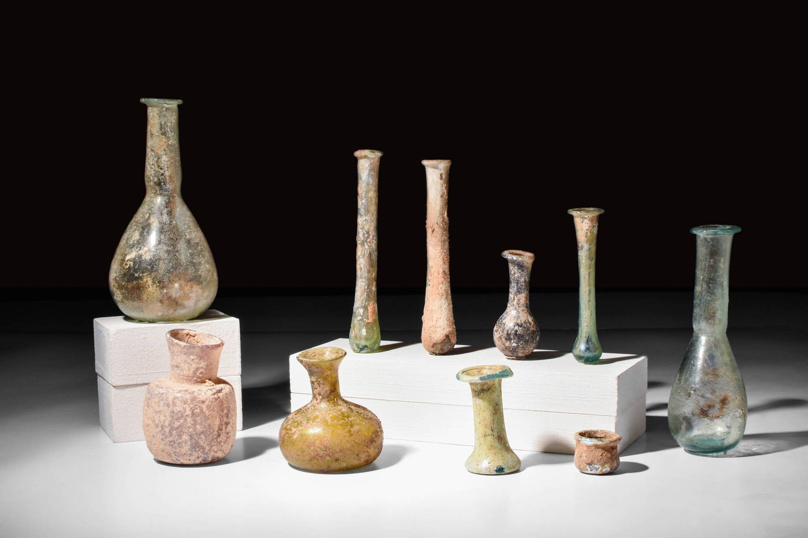 Collection Of 10 Roman Glass Bottles Auction