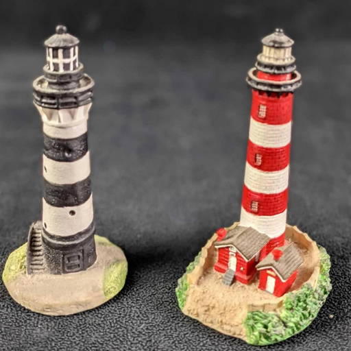 Two Resin Lighthouse Figurines Assateague & Cape Canaveral
