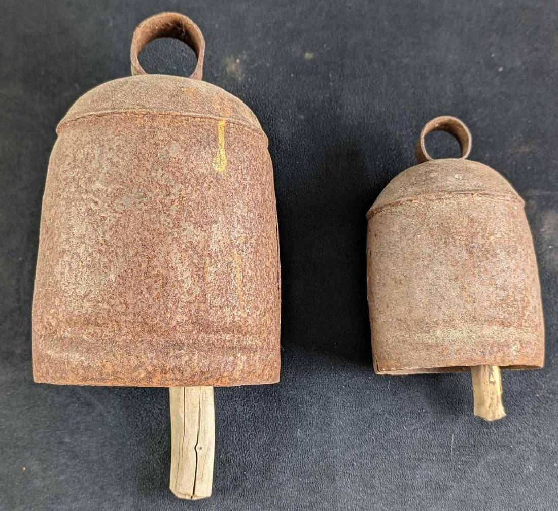 Two Rustic Tin Farm Bells With Wooden Clappers Auction