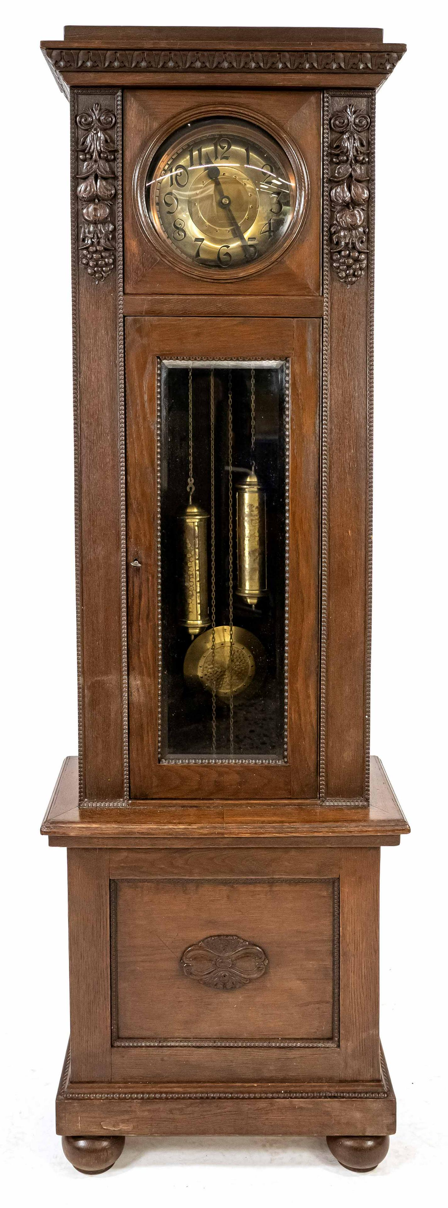 floor standing clock around 1920, dark oak, with carved decorations on ...